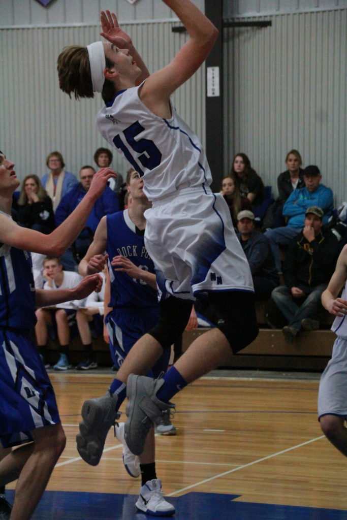 Mustangs split basketball games with Rock Port: girls, 48-25; boys, 50 ...